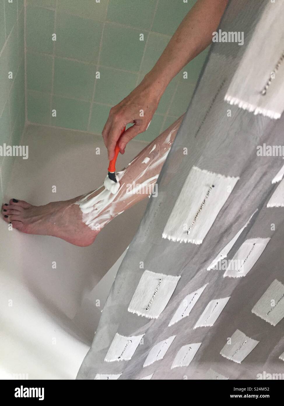Adult Woman Shaving Her Legs In The Shower With A Safety Razor Usa 3854