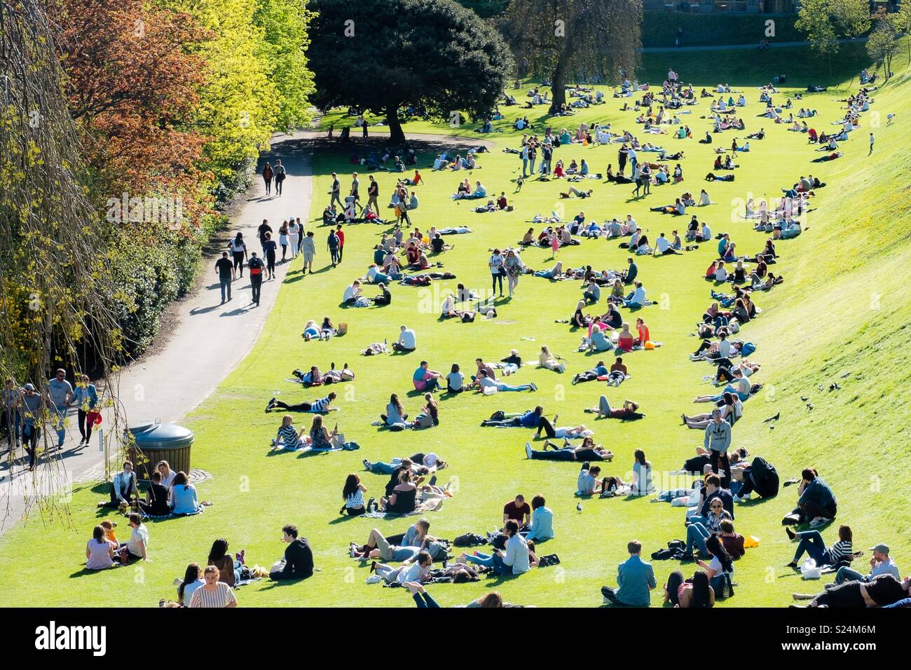 Soaking up the sun in Edinburgh Stock Photo - Alamy