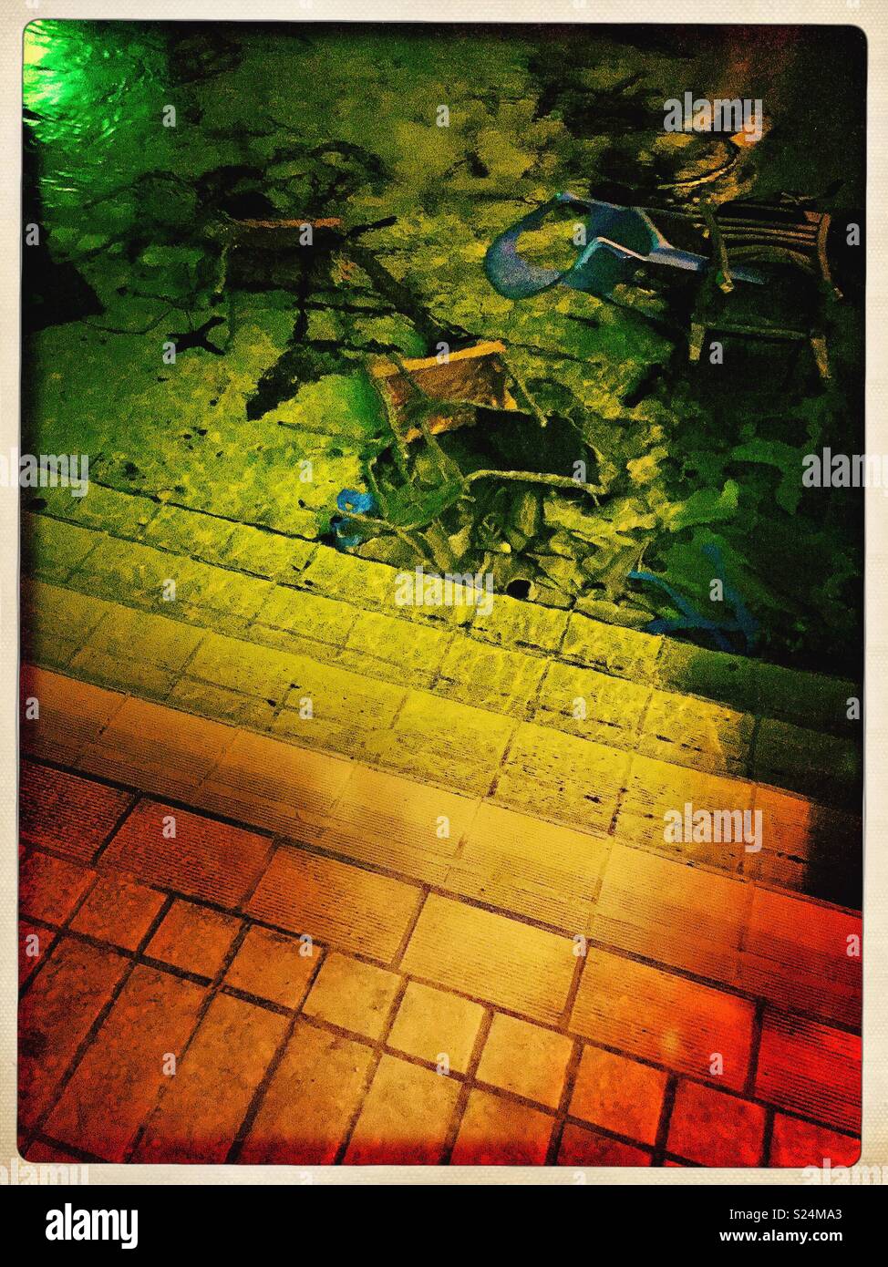 Abandoned swimming pool full of rubbish, chairs and trash Stock Photo ...
