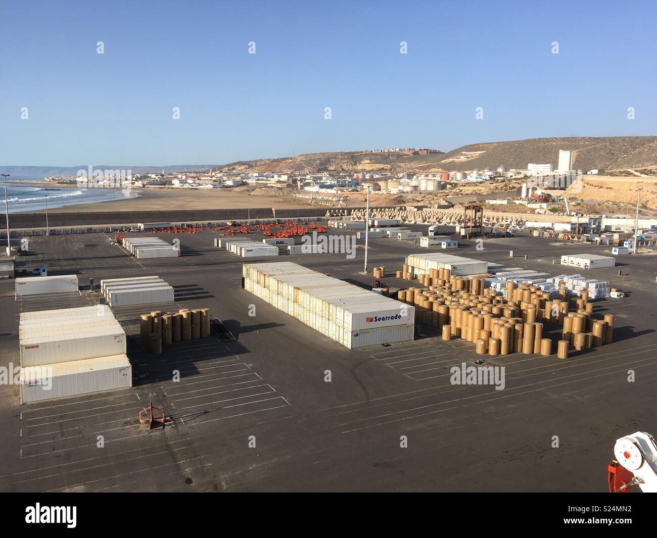Containers in the Port of Agadir, Morocco, and the town of Anza in the ...