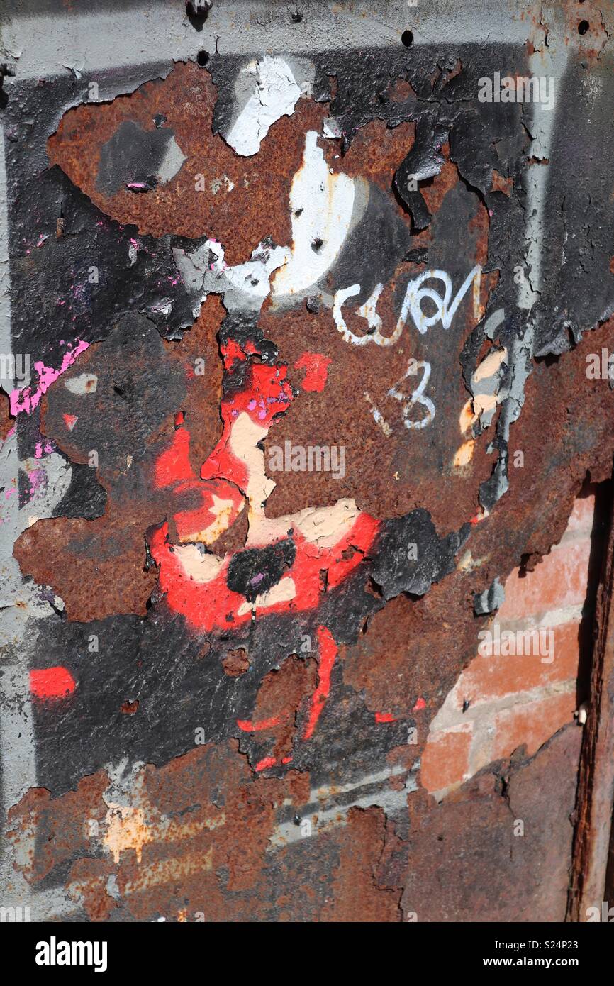 Rust and graffiti Stock Photo - Alamy