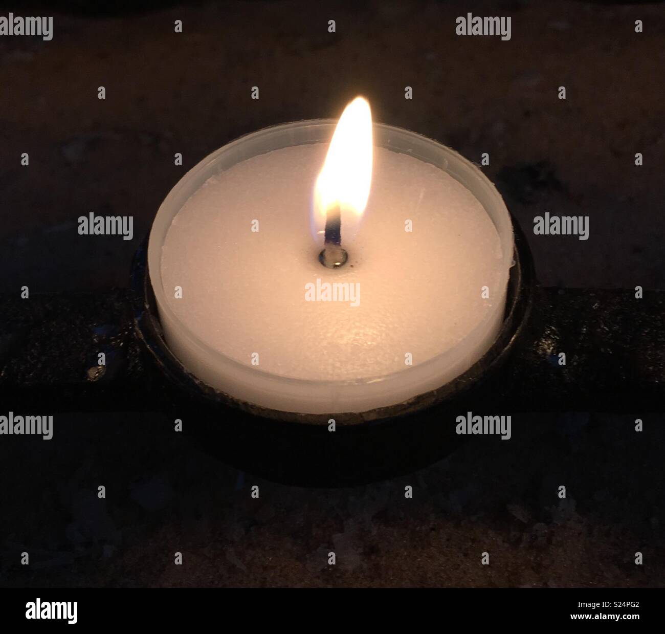 Lighting a Candle Stock Photo - Alamy