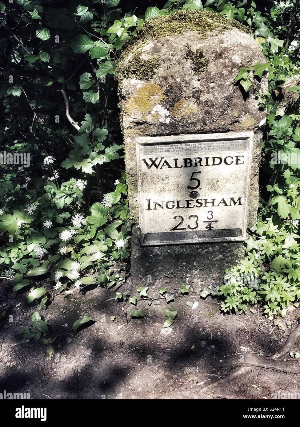 Old historic direction stone Stock Photo - Alamy