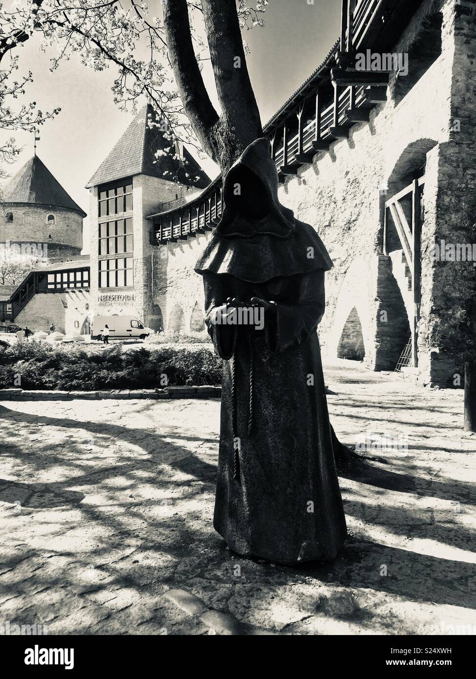 Monk statue in Tallin Stock Photo - Alamy