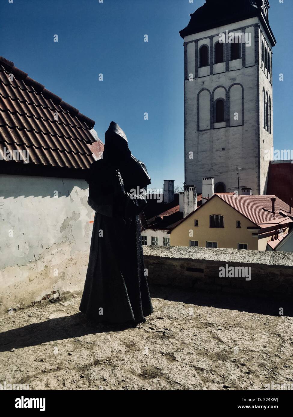 Monk statue in Tallin Stock Photo - Alamy