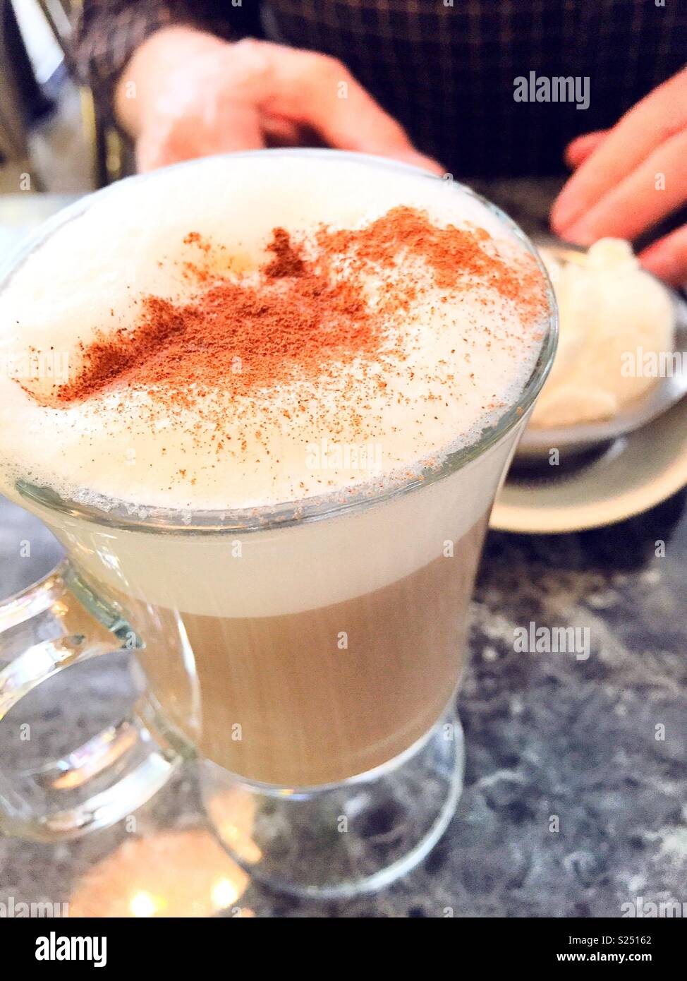 Cappuccino served with desserts at an Italian restaurant, Little Italy ...