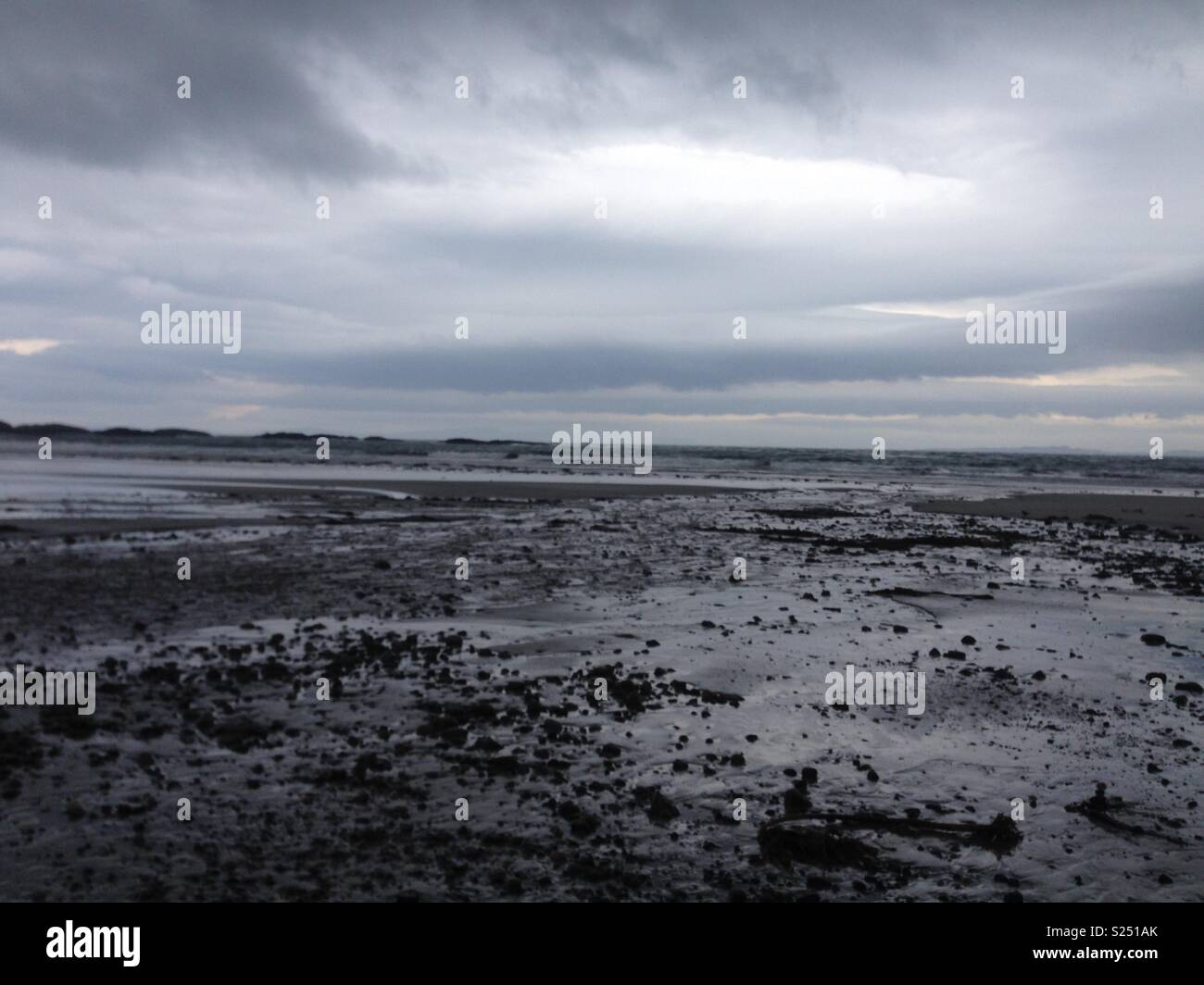 Moody beach scene Stock Photo - Alamy