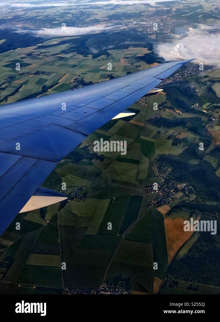 Plane over France Stock Photo - Alamy