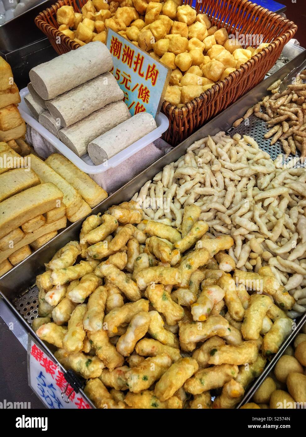 Different types of tofu for sale in a food market, Yuen Long, New ...