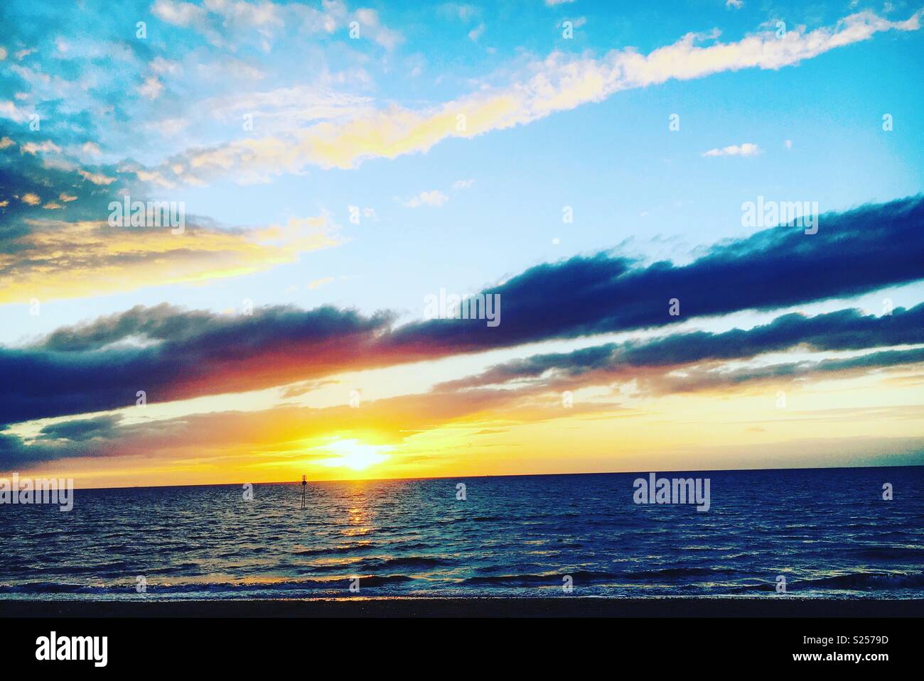 Sunset at sea Stock Photo - Alamy