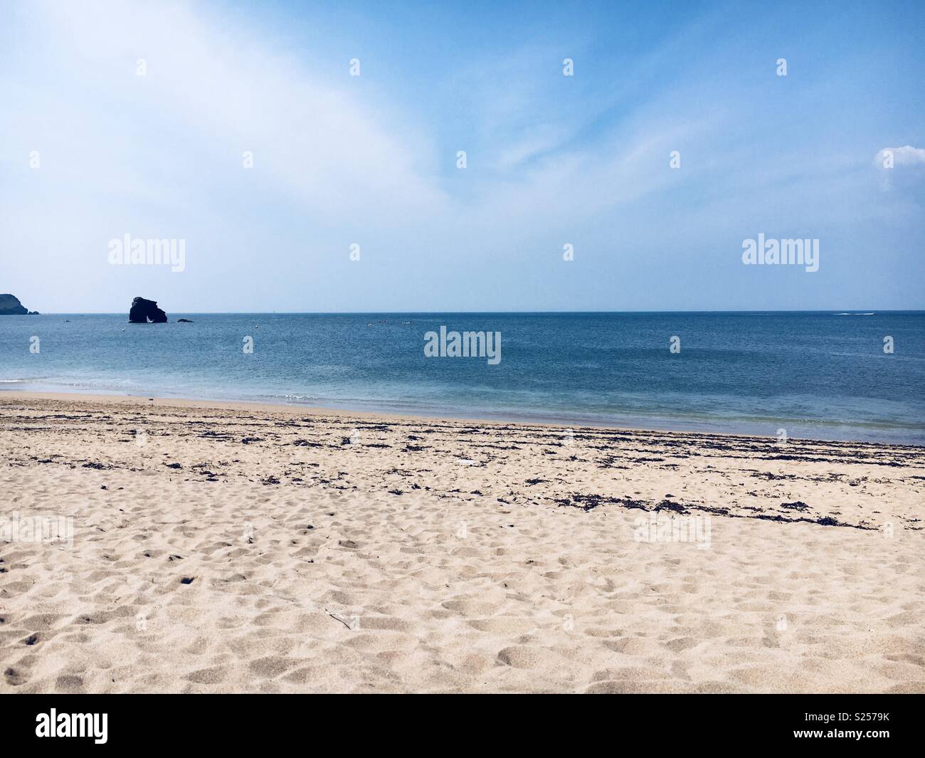 Beach with famous rock Stock Photo - Alamy