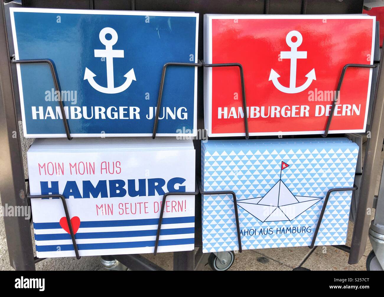 Postcards on a rack Stock Photo - Alamy