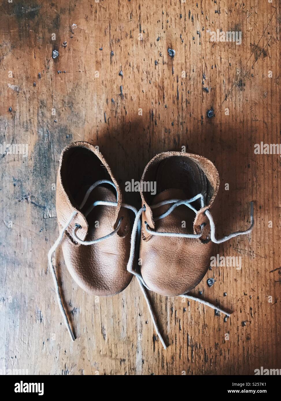 A pair of handmade leather shoes for a toddler Stock Photo - Alamy