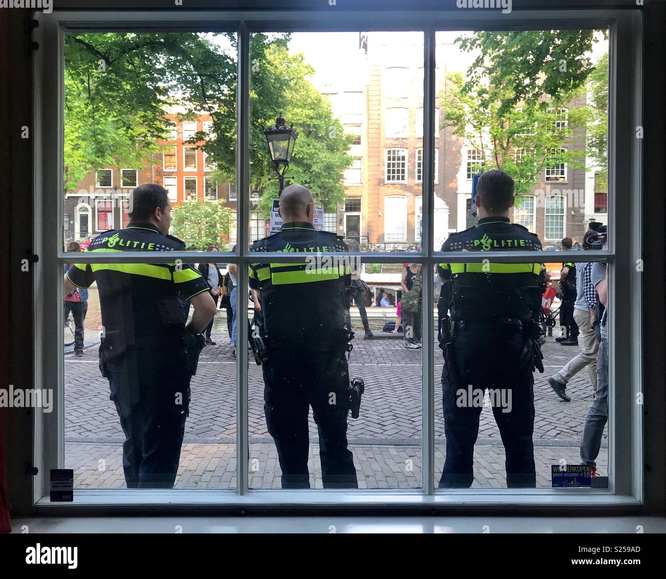 Dutch police in front of a window in Amsterdam, the Netherlands Stock ...