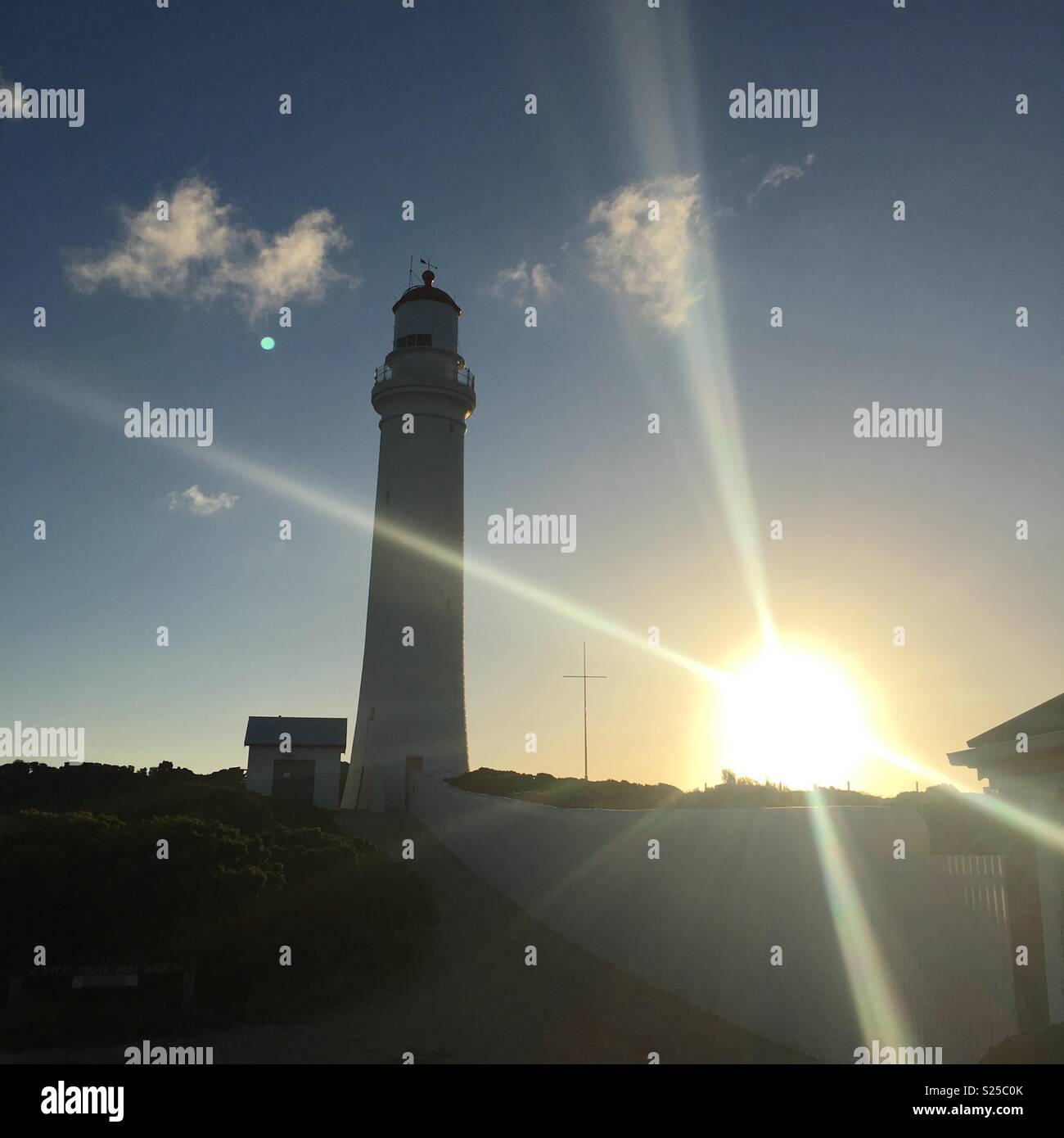 Sun setting at the lighthouse, Cape Nelson, Australia Stock Photo - Alamy