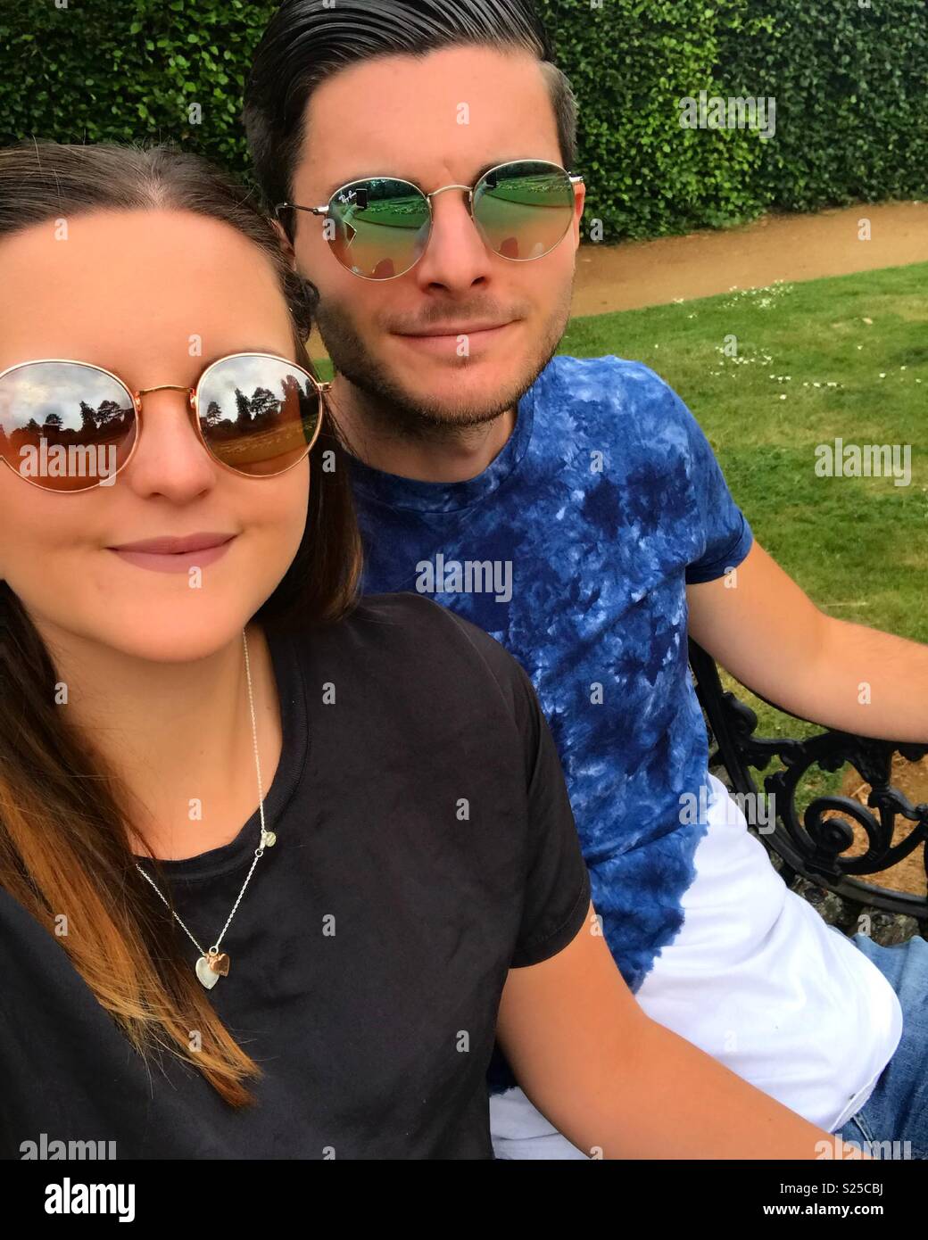Boyfriend and girlfriend smiles Stock Photo - Alamy