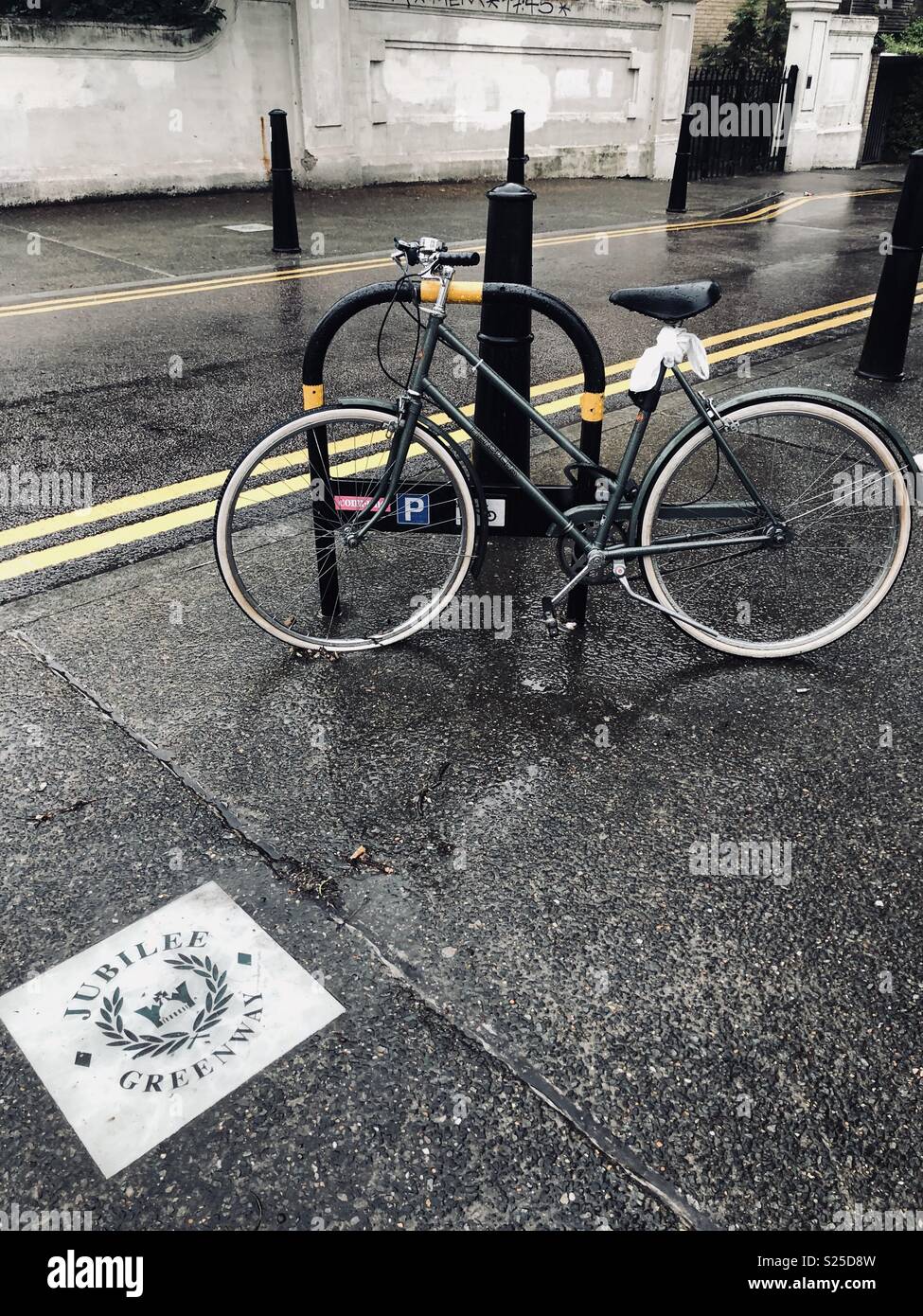 Bike tied to a bike stand in bow Stock Photo - Alamy