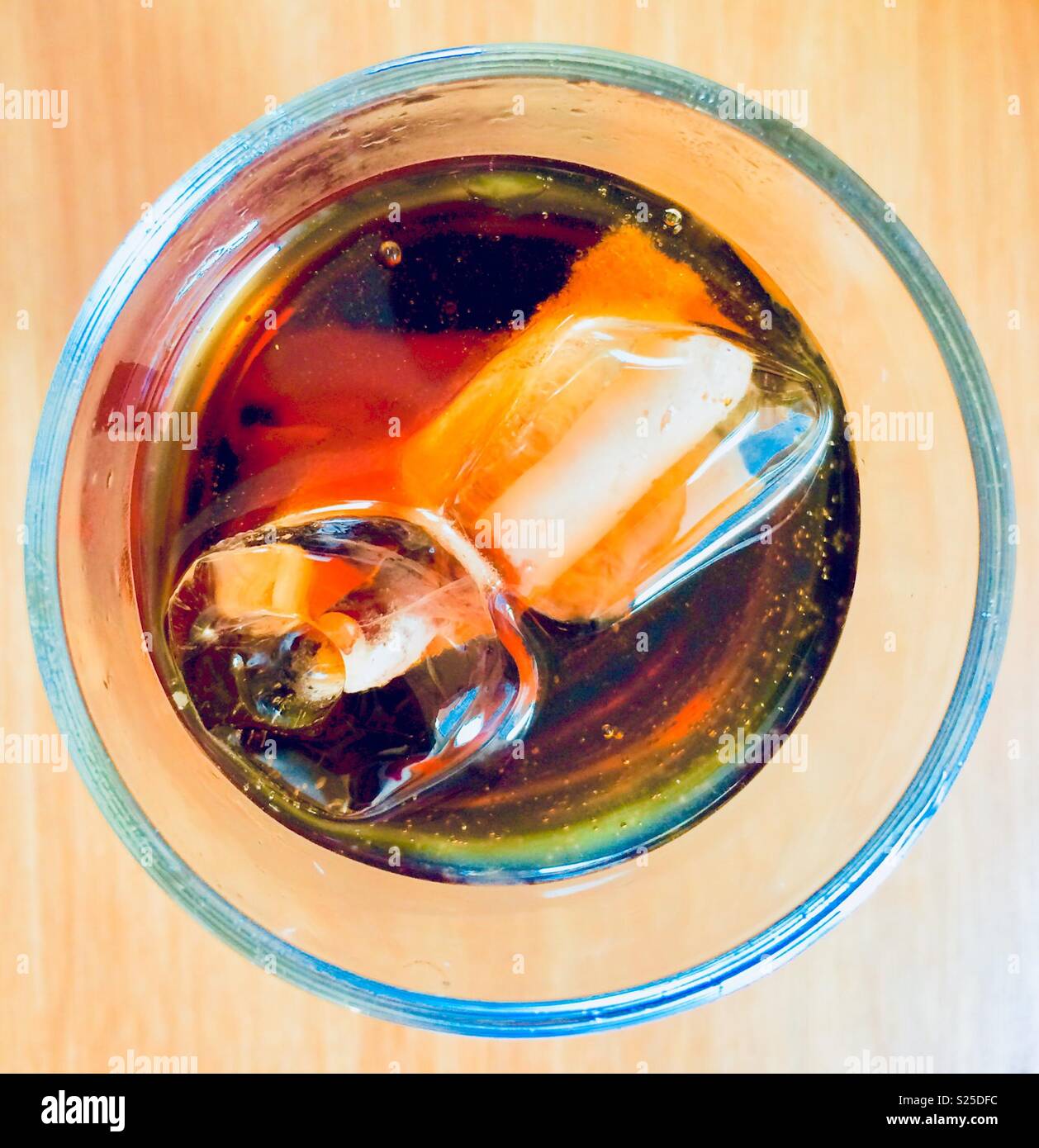 Aerial view of drink with ice cubes Stock Photo - Alamy