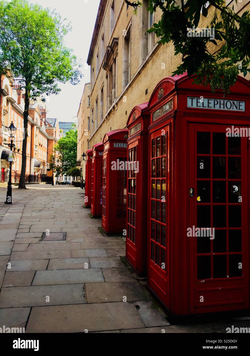 Row of telephone boxes, Covent Garden, London Stock Photo - Alamy