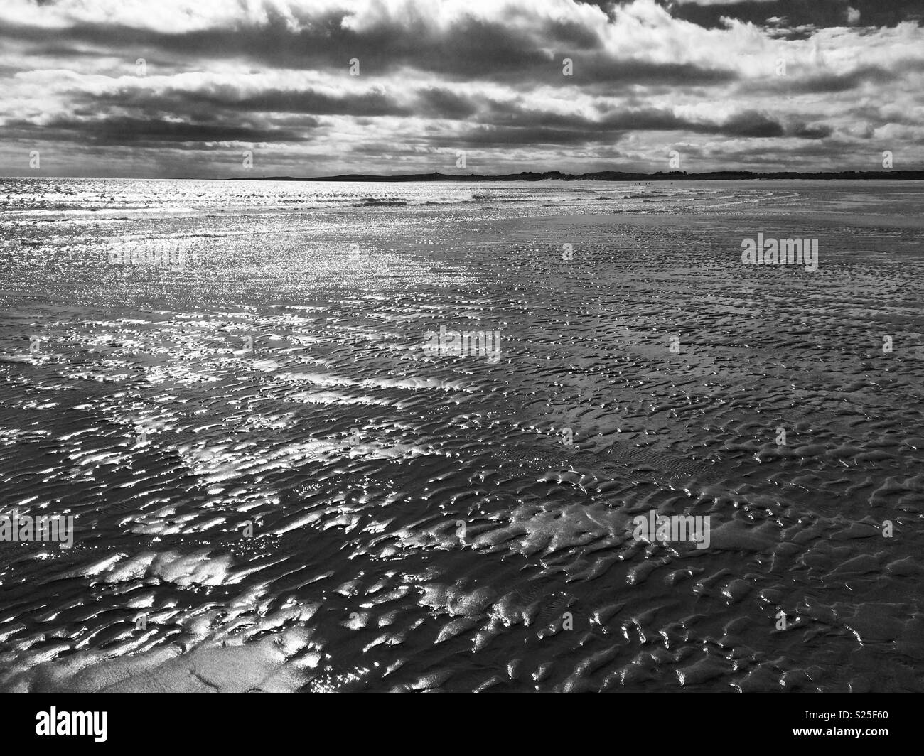 Wet sand reflections Black and White Stock Photos & Images - Alamy