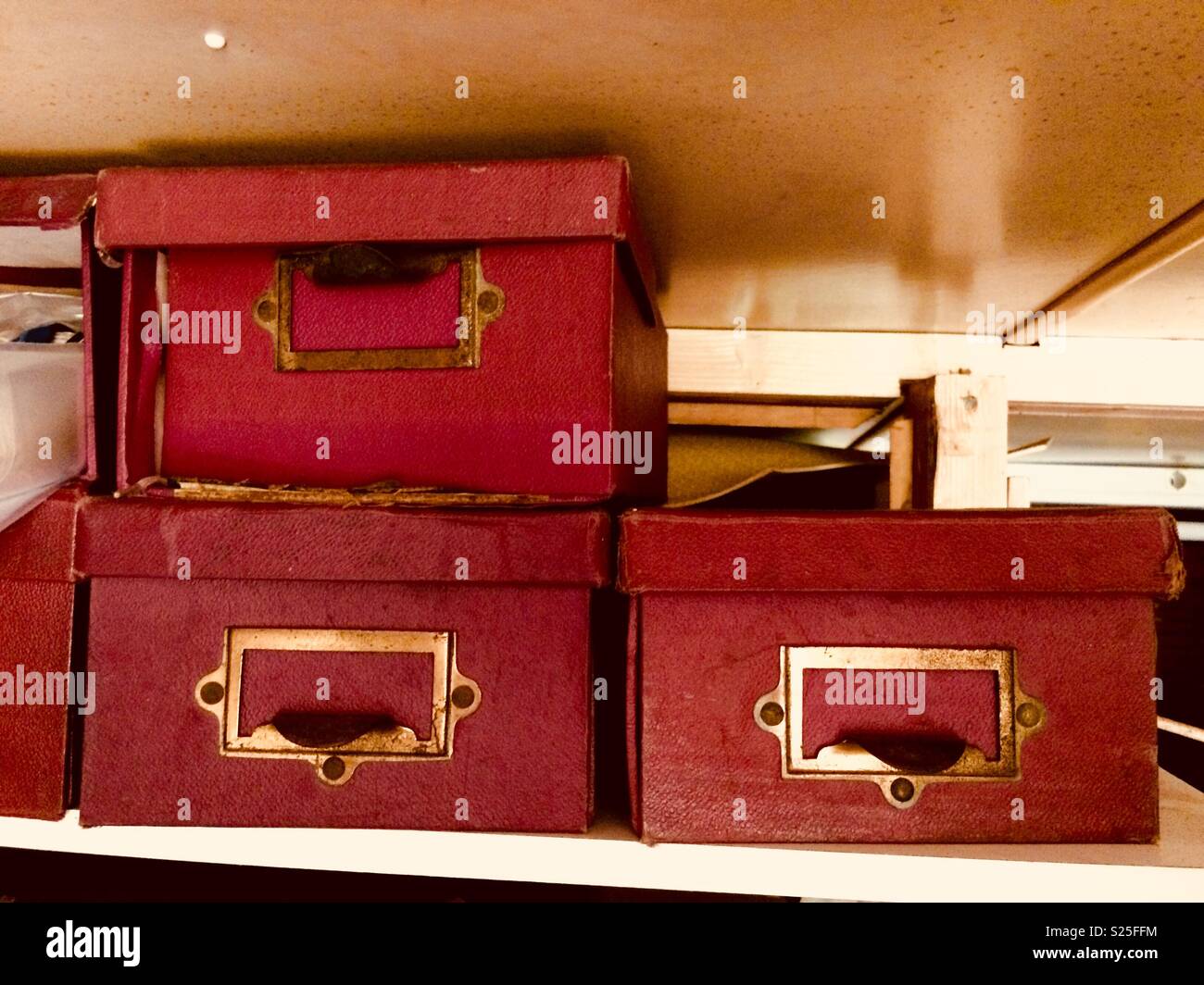 Old box files on shelf Stock Photo - Alamy