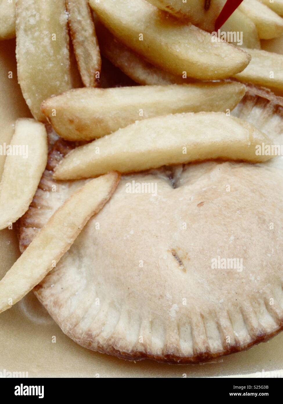 Pie with chips Stock Photo - Alamy