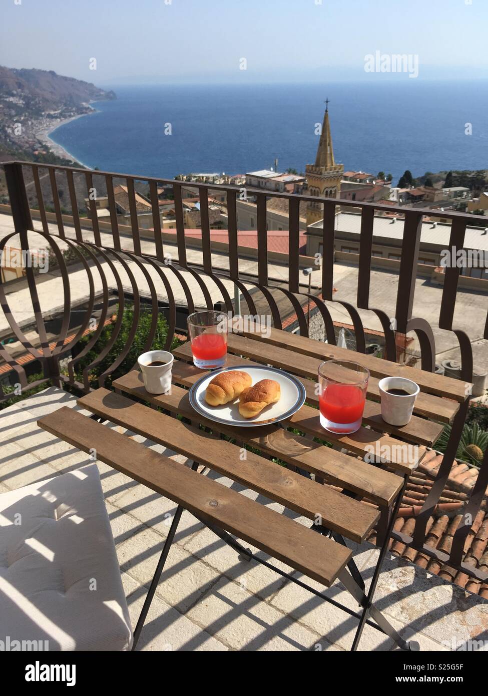 Breakfast on balcony in Taormina, Sicily Stock Photo - Alamy