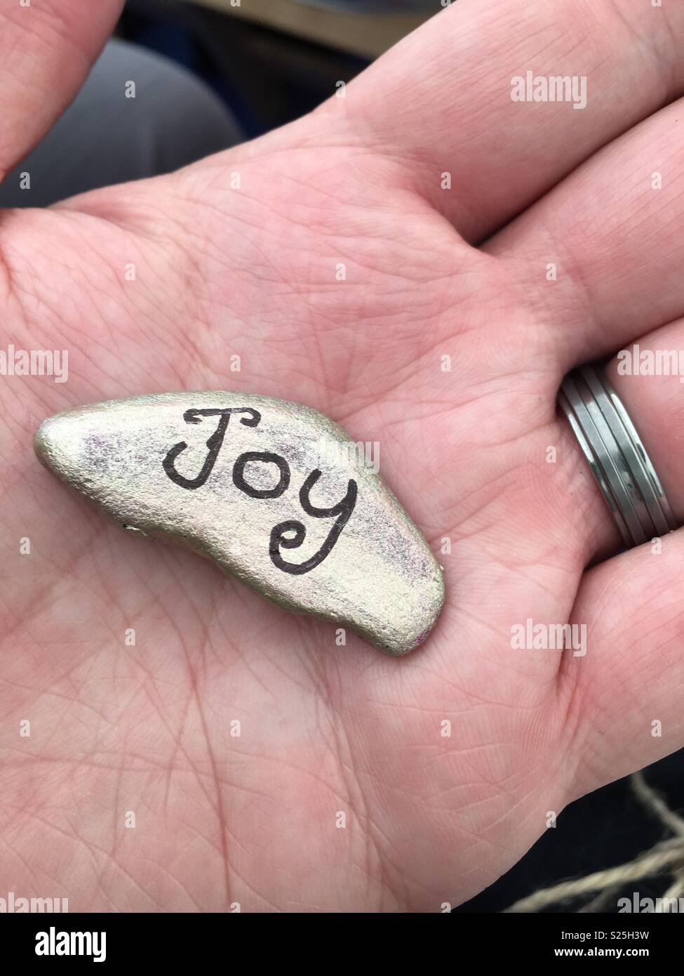 Joy written in stone hi-res stock photography and images - Alamy