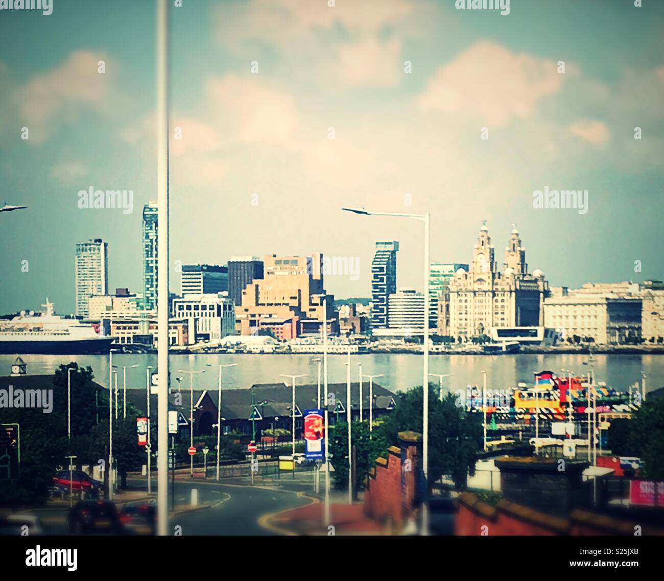 The liver building with cruise ship and mersey ferry hi-res stock ...