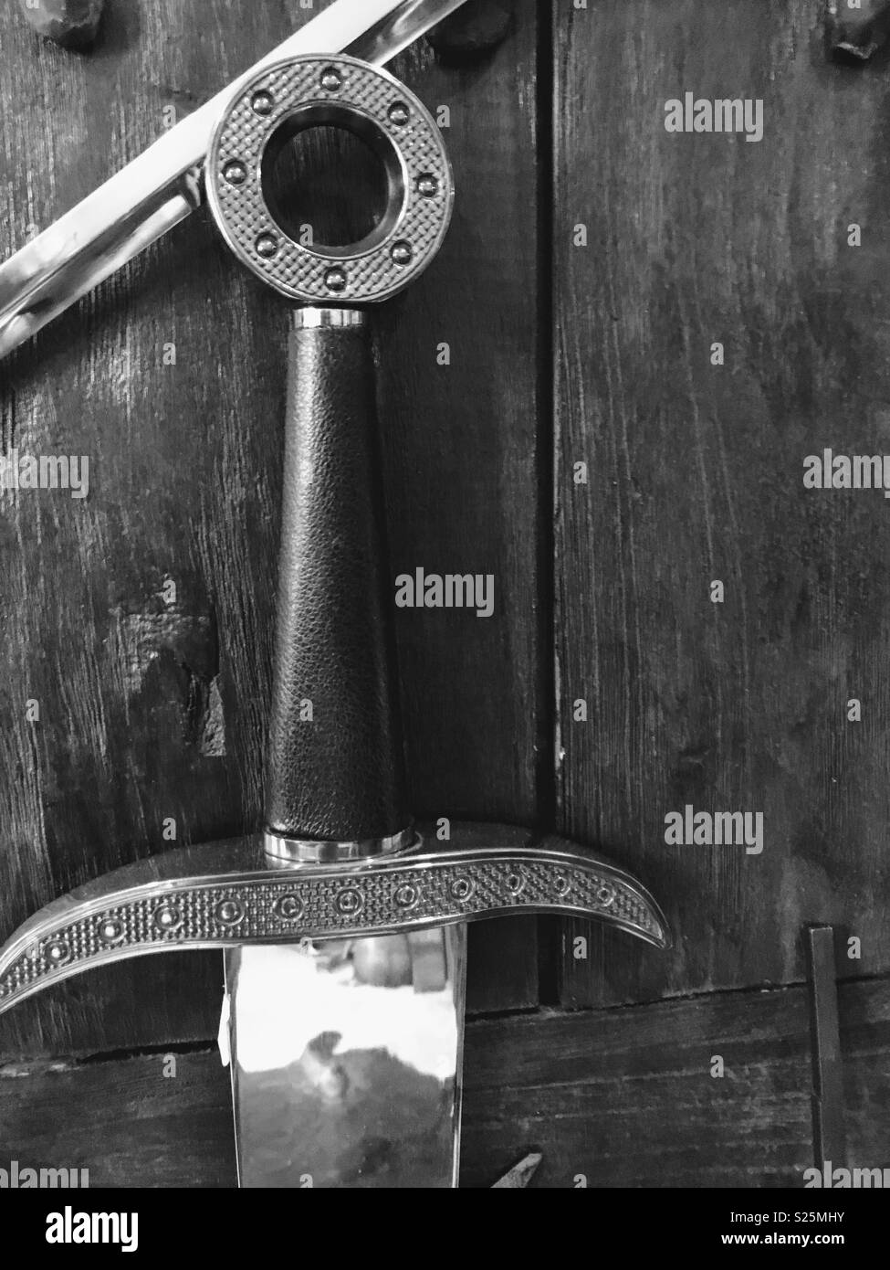 Sword hilt cross hi-res stock photography and images - Alamy