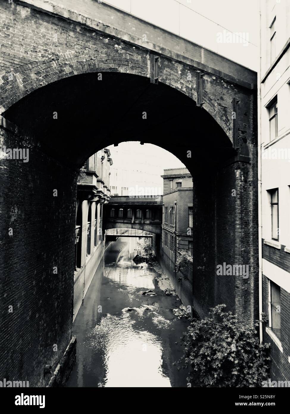 Bridge over water Manchester black and white Stock Photo - Alamy