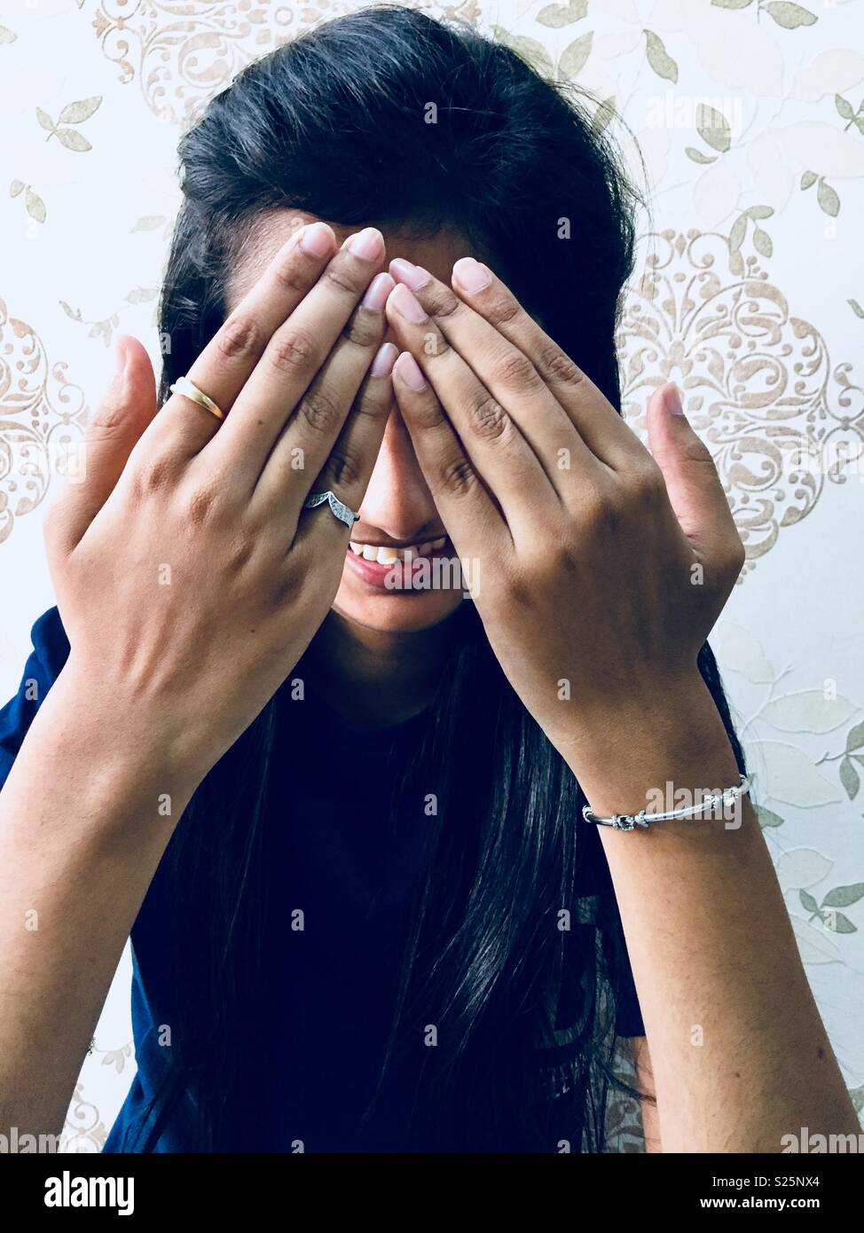 Girl hide hi-res stock photography and images - Alamy