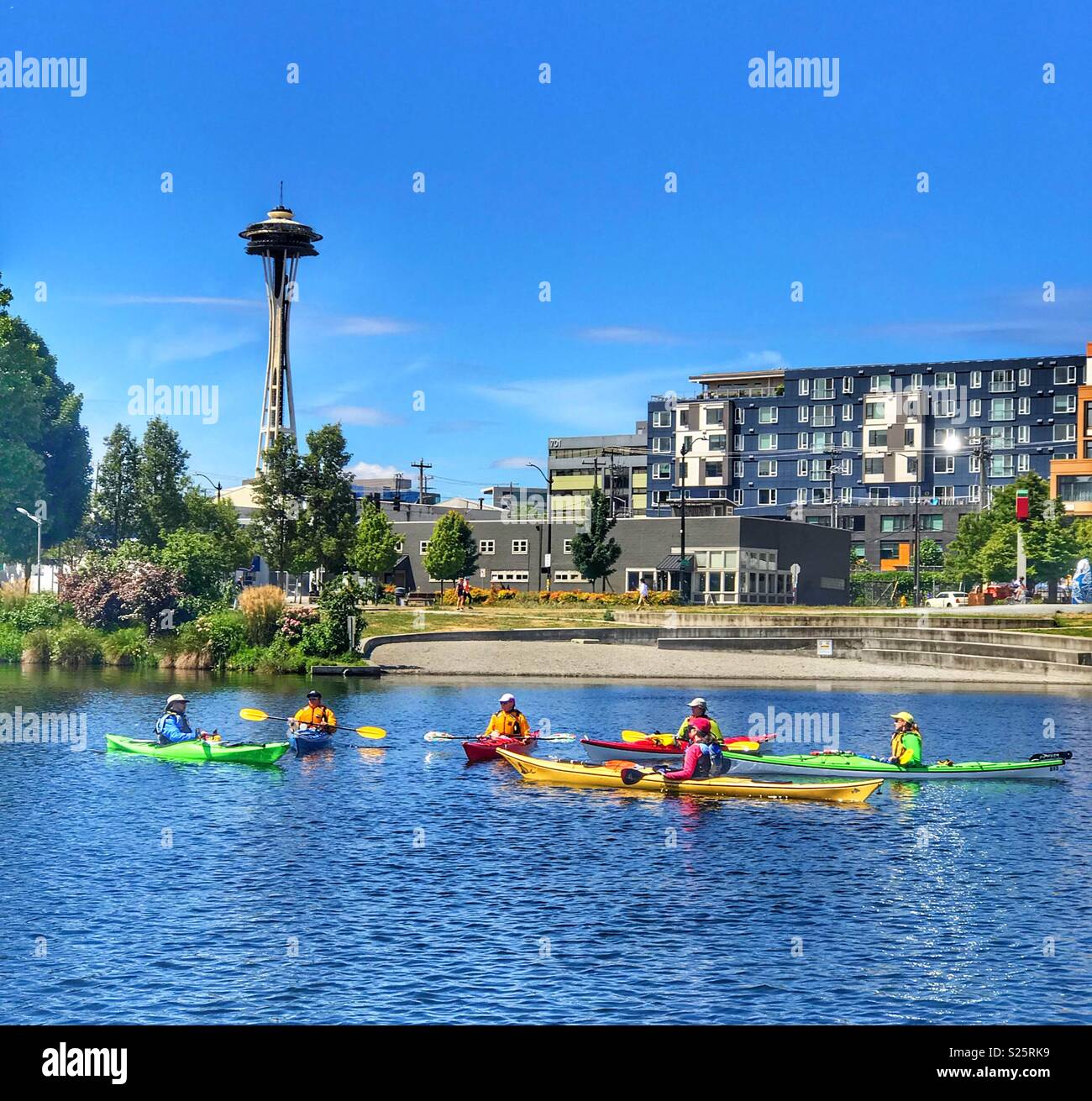 People out taking kayak lessons on lake union in Seattle Washington ...