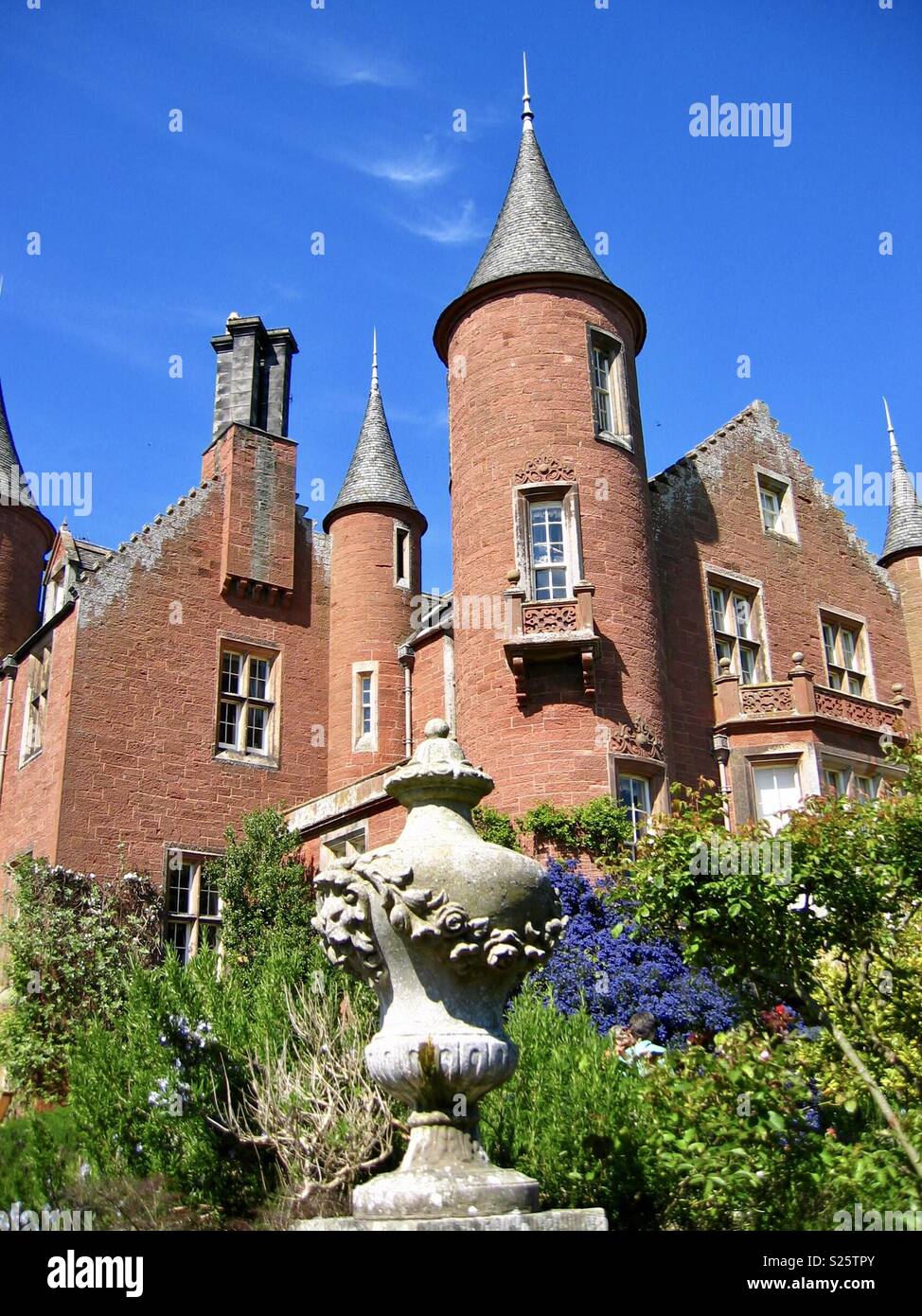 Red stone turrets on stately home Scottish castle Stock Photo - Alamy