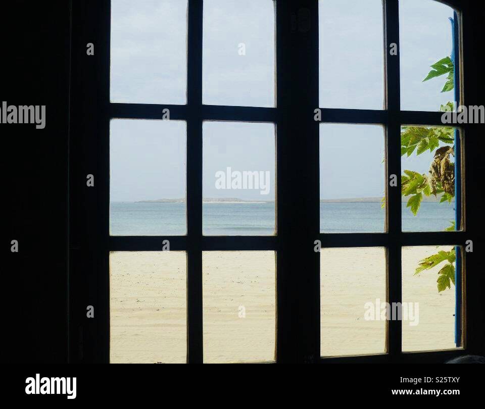 Sea through a window Stock Photo - Alamy