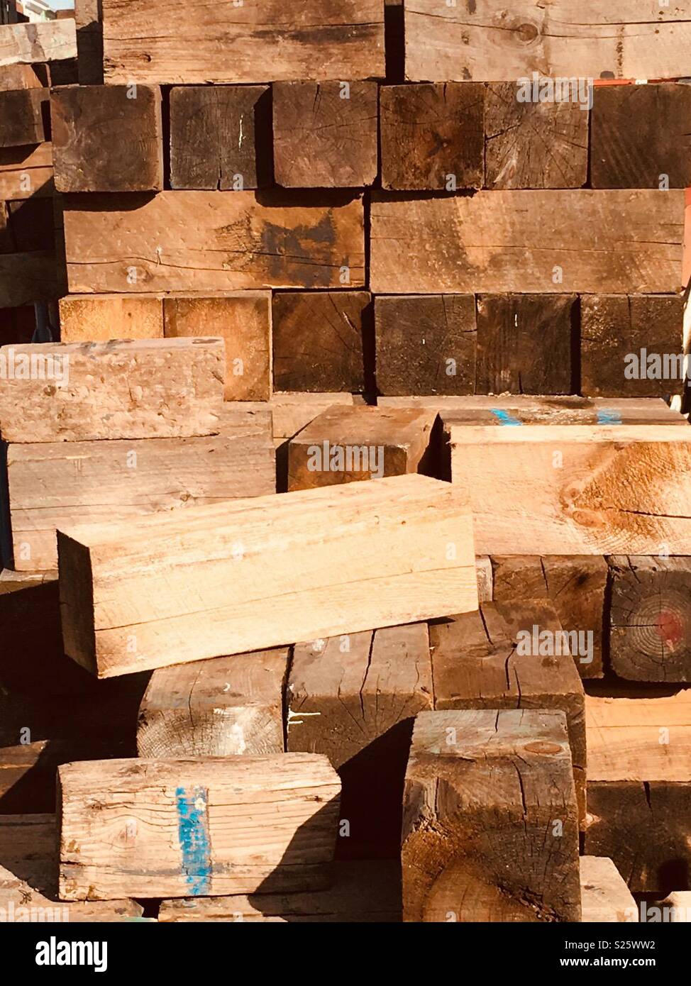 Wooden blocks piled up Stock Photo - Alamy