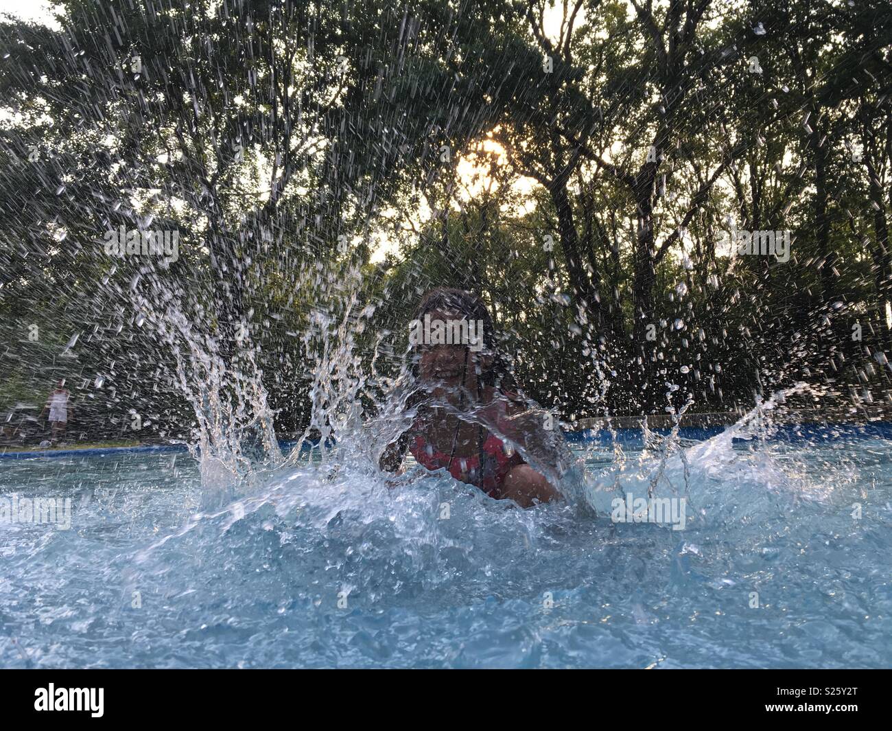 Water splashing into pool hi-res stock photography and images - Alamy