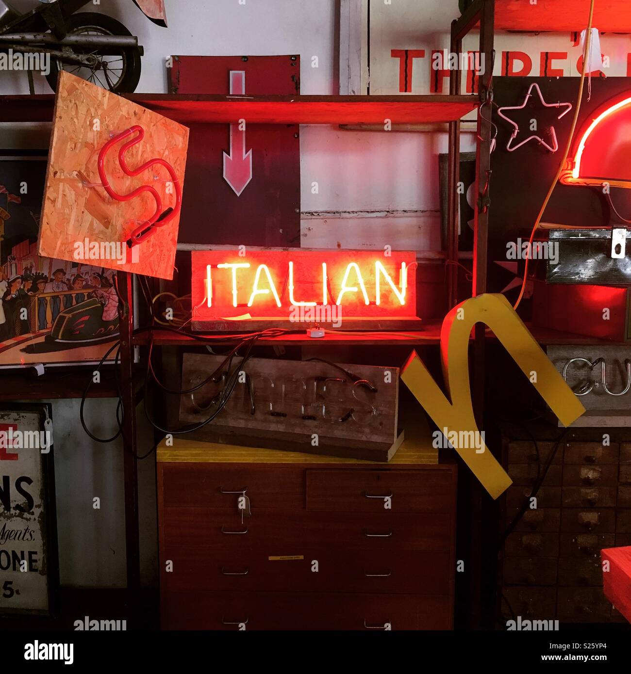 ITALIAN neon sign in antique shop Stock Photo - Alamy