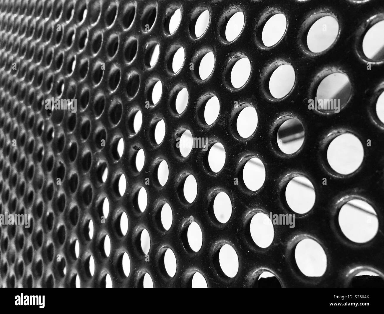 Black metal texture holes hi-res stock photography and images - Alamy