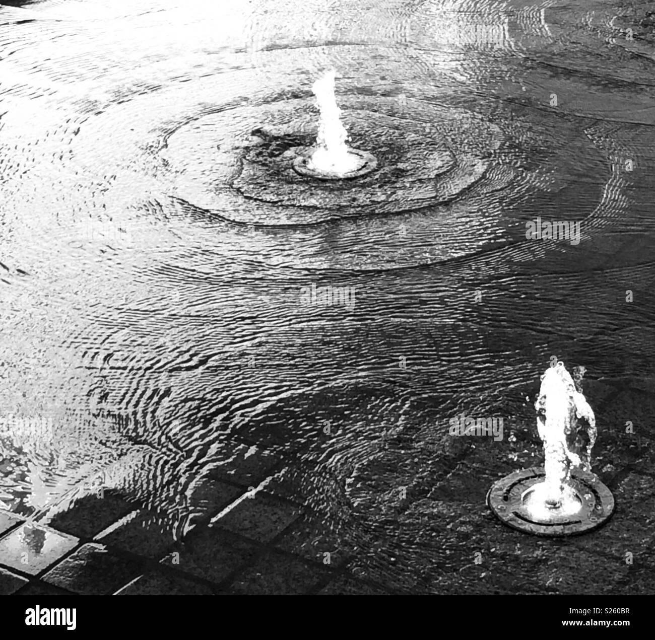 Splish splash splosh Black and White Stock Photos & Images - Alamy