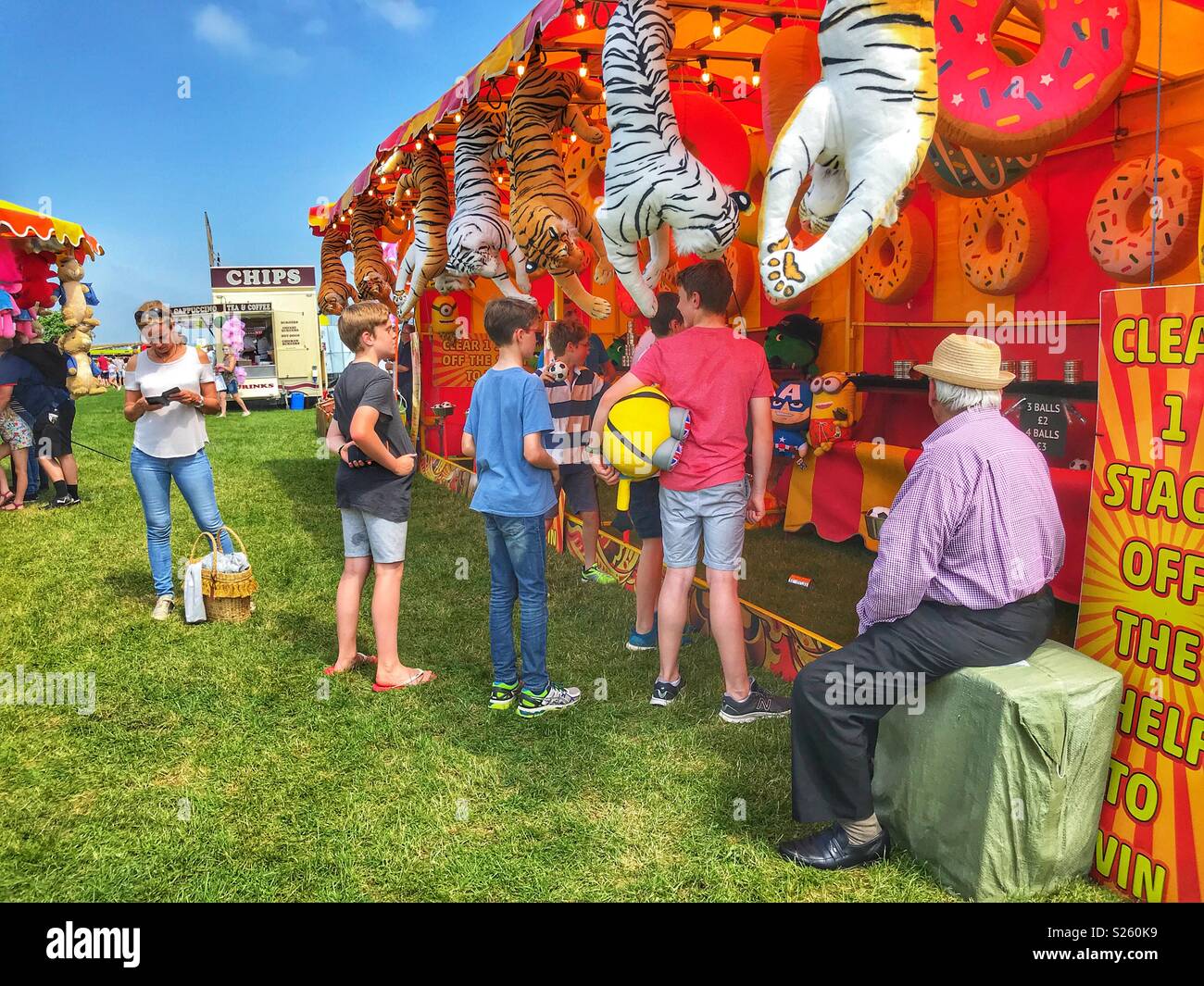 Coconut shy game at the fair hi-res stock photography and images - Alamy