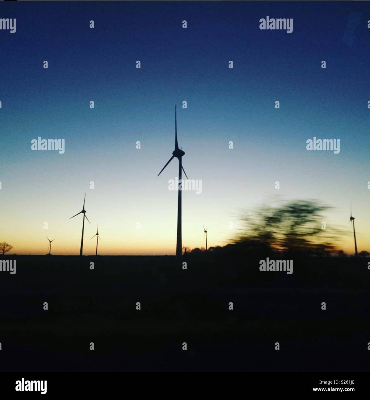 Wind turbines at night Stock Photo - Alamy