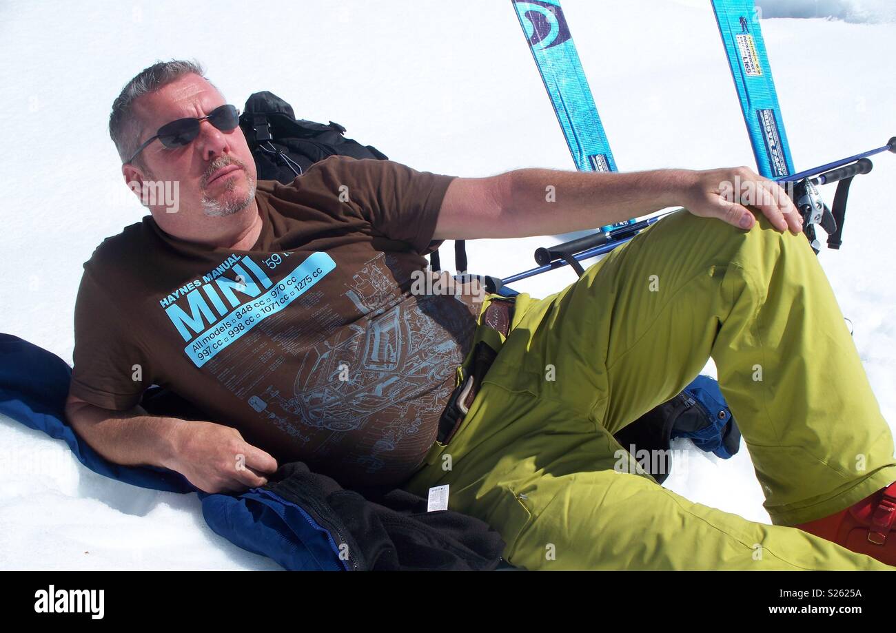 Sunbathing in snow hi-res stock photography and images - Alamy