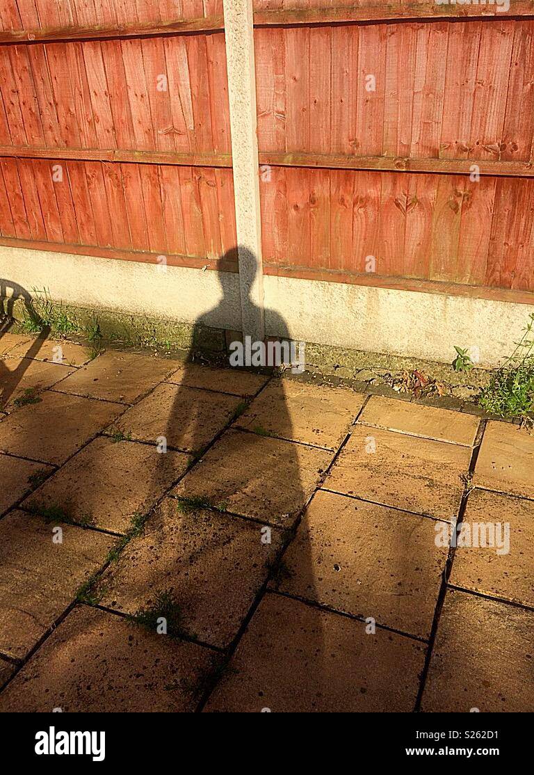 Shadowy figure on a garden patio. Liverpool, United Kingdom Stock Photo ...