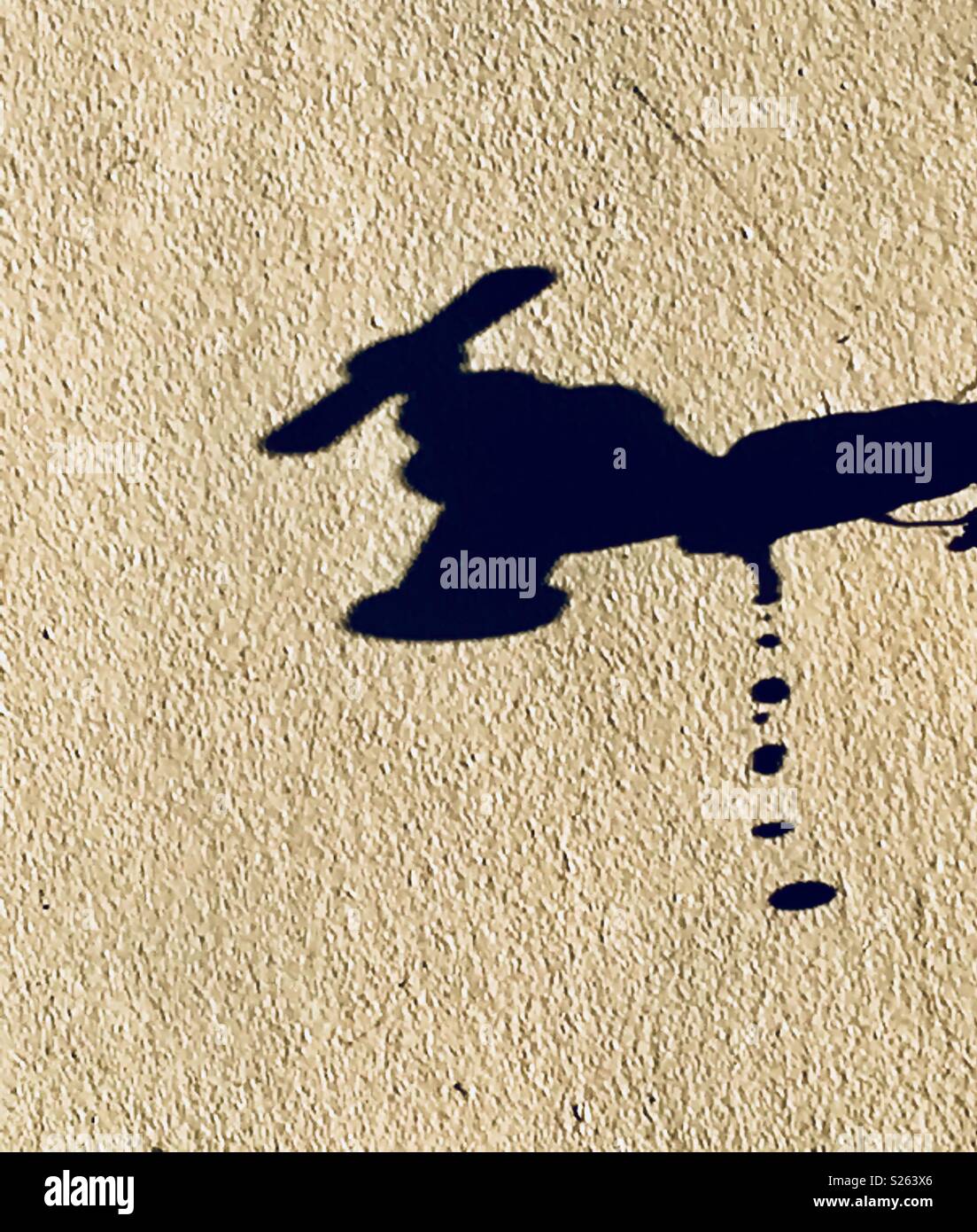 Dripping tap shadow Stock Photo - Alamy