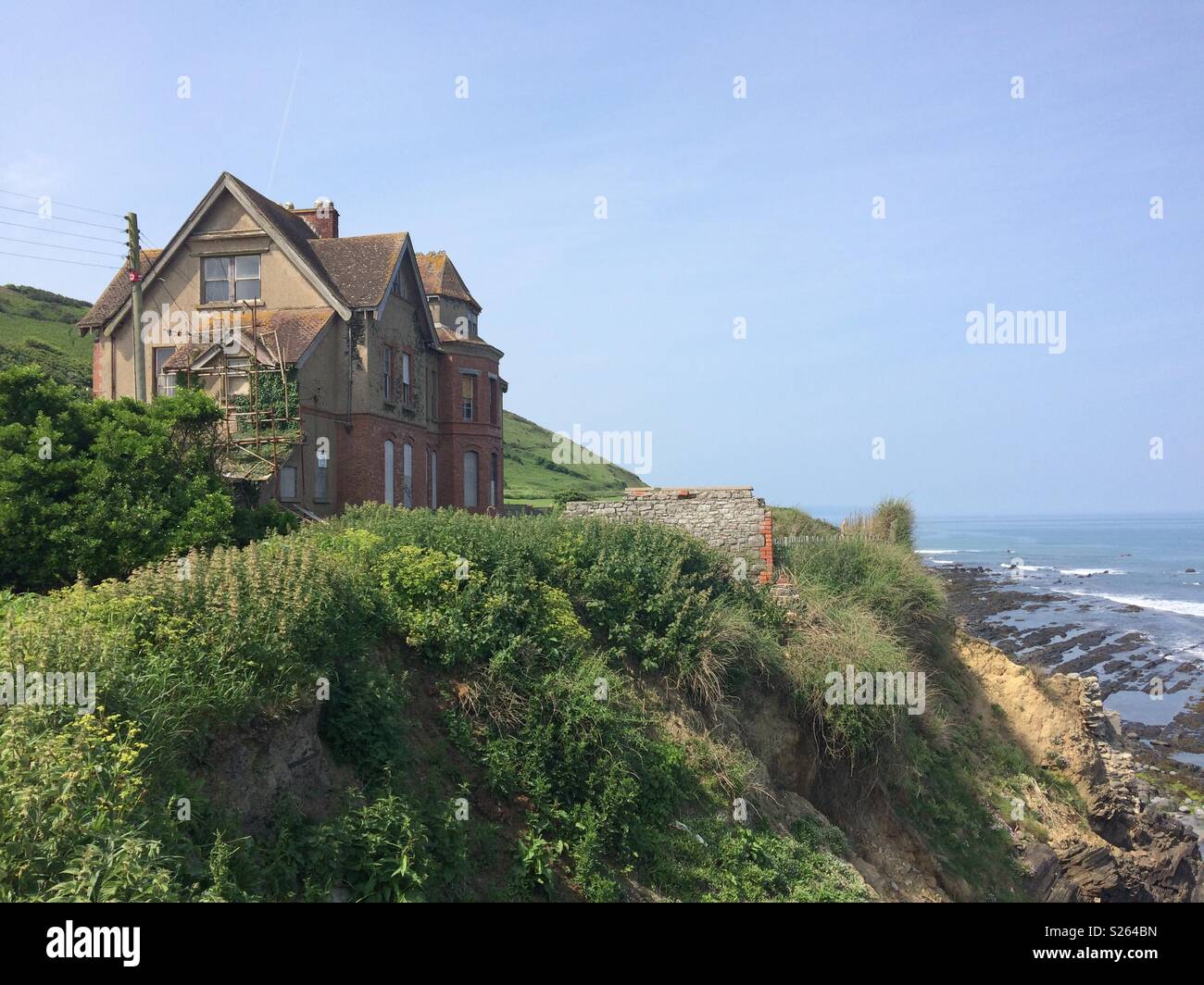 Last house standing Stock Photo - Alamy