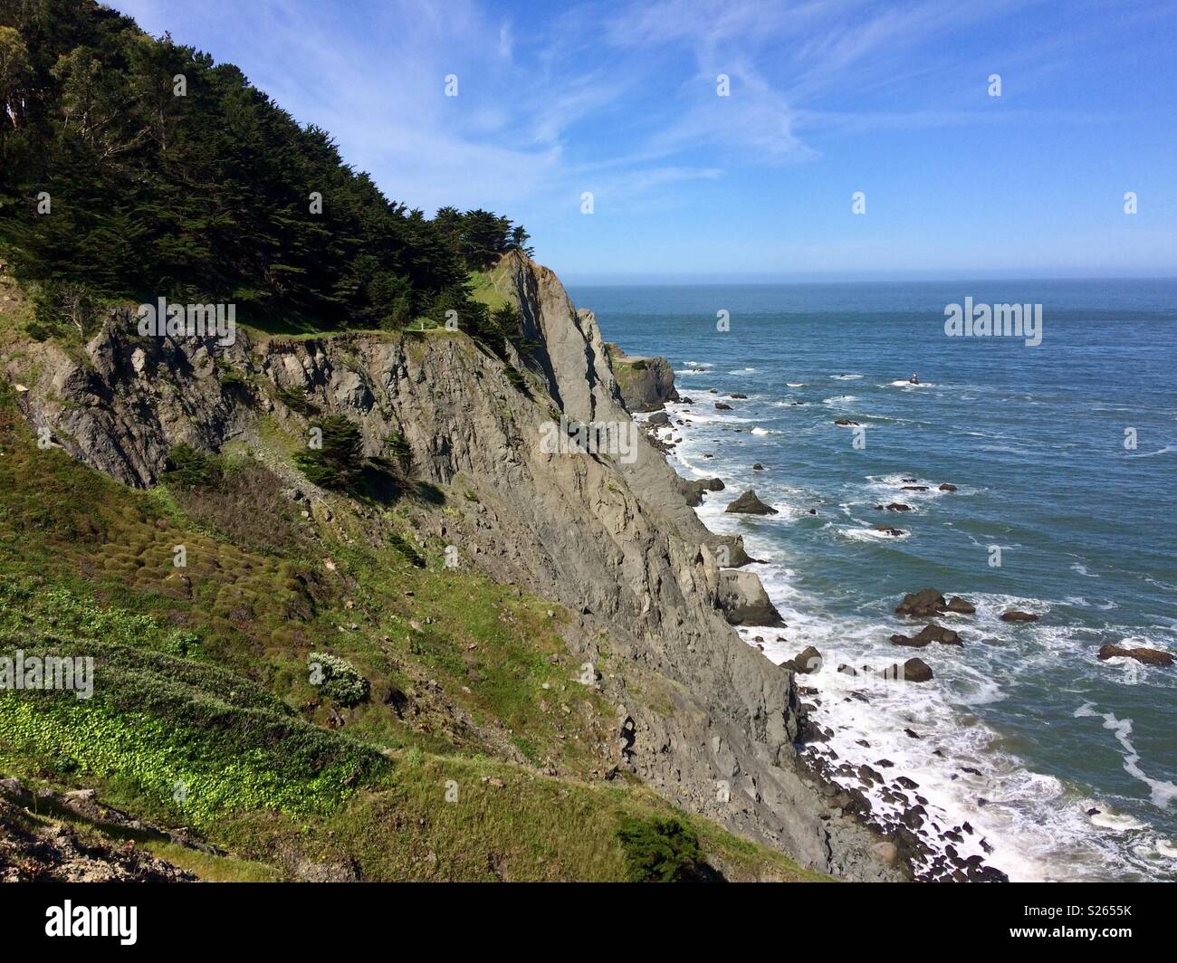 Mar, sol y montaña Stock Photo - Alamy