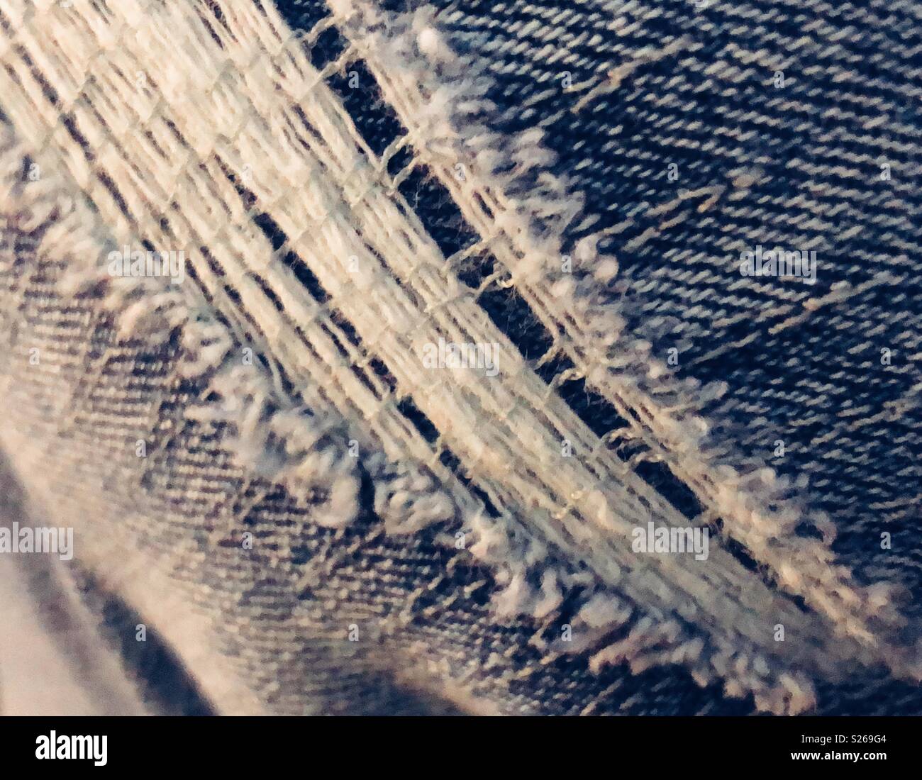 Ripped fabric frayed hi-res stock photography and images - Alamy