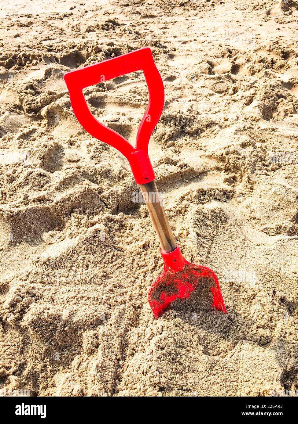 Digging sand with spade hi-res stock photography and images - Alamy