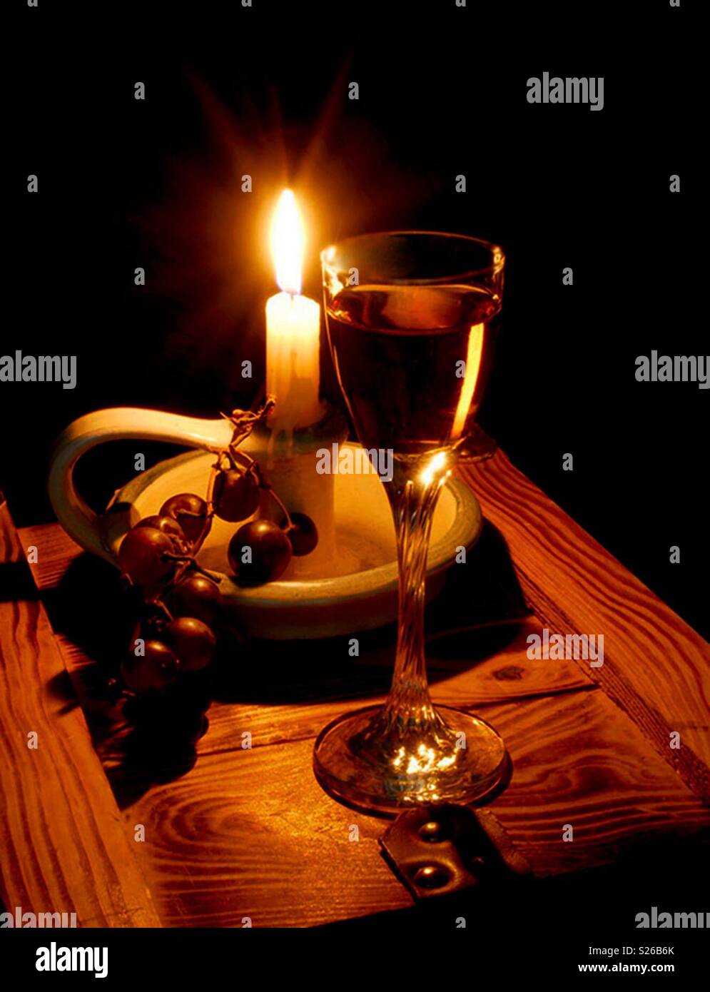 Still life of candle and wine Stock Photo - Alamy